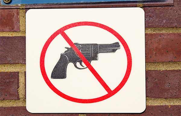 Ban-Guns-Sign - Guns in the News